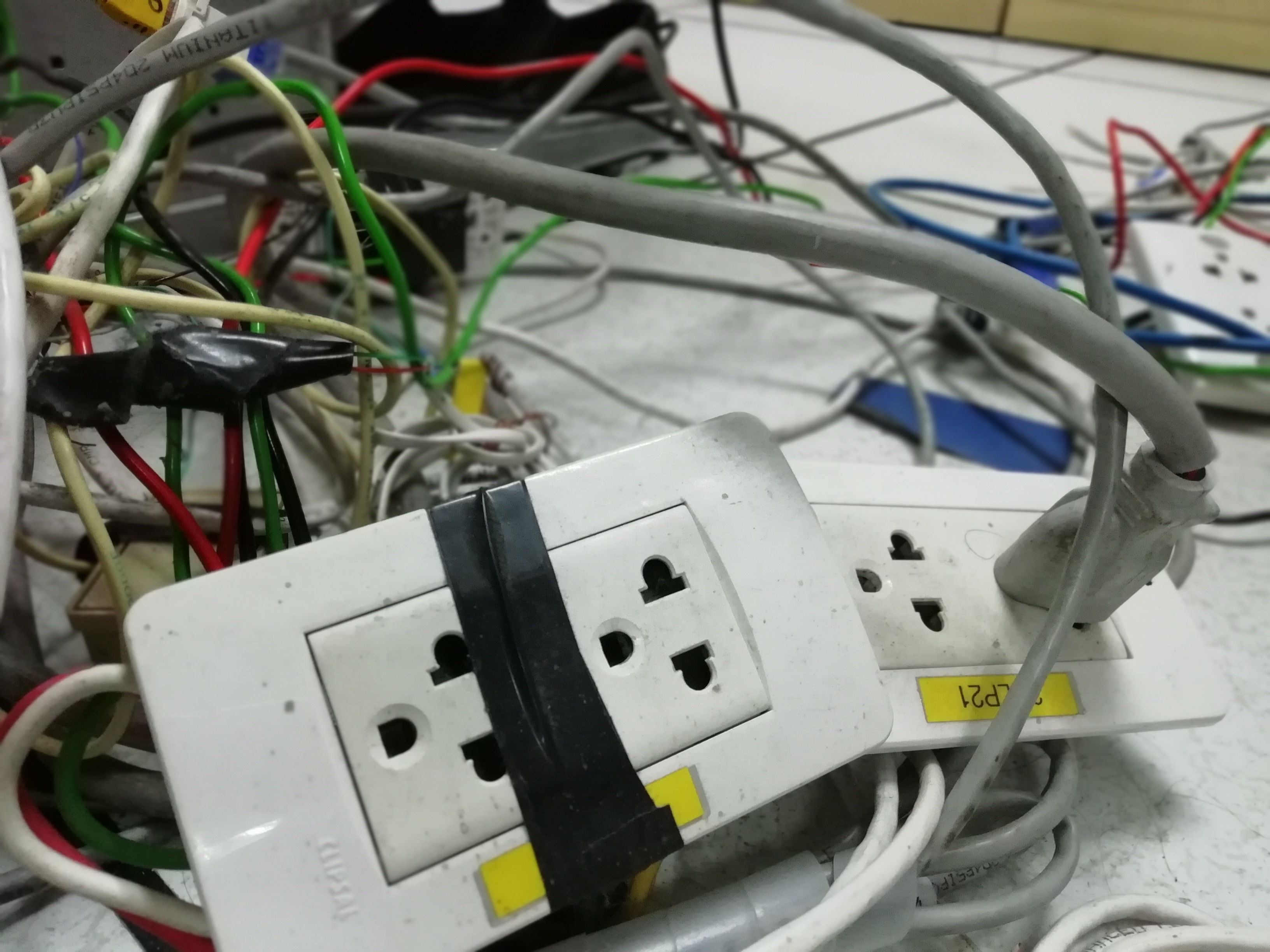 fire on electric wire plug in indoor, electric short circuit causing ...